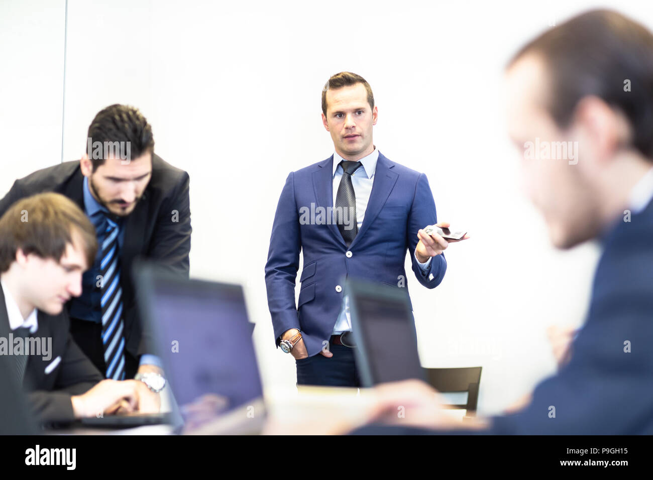 Corporate business team office meeting Stock Photo - Alamy