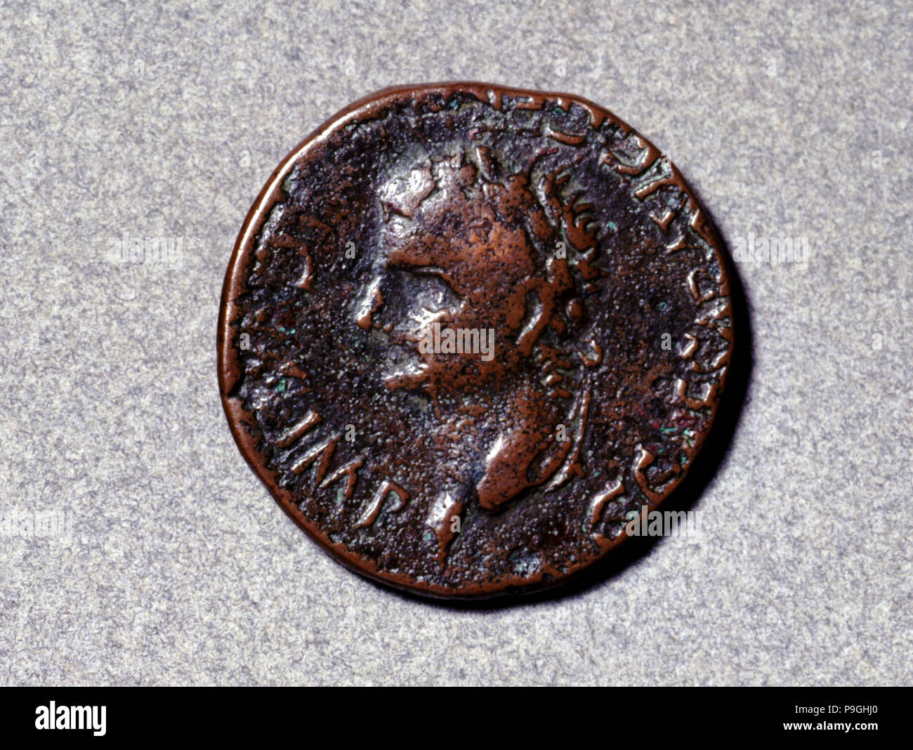 Roman coin from the first half of the 1st. century, having a head ...