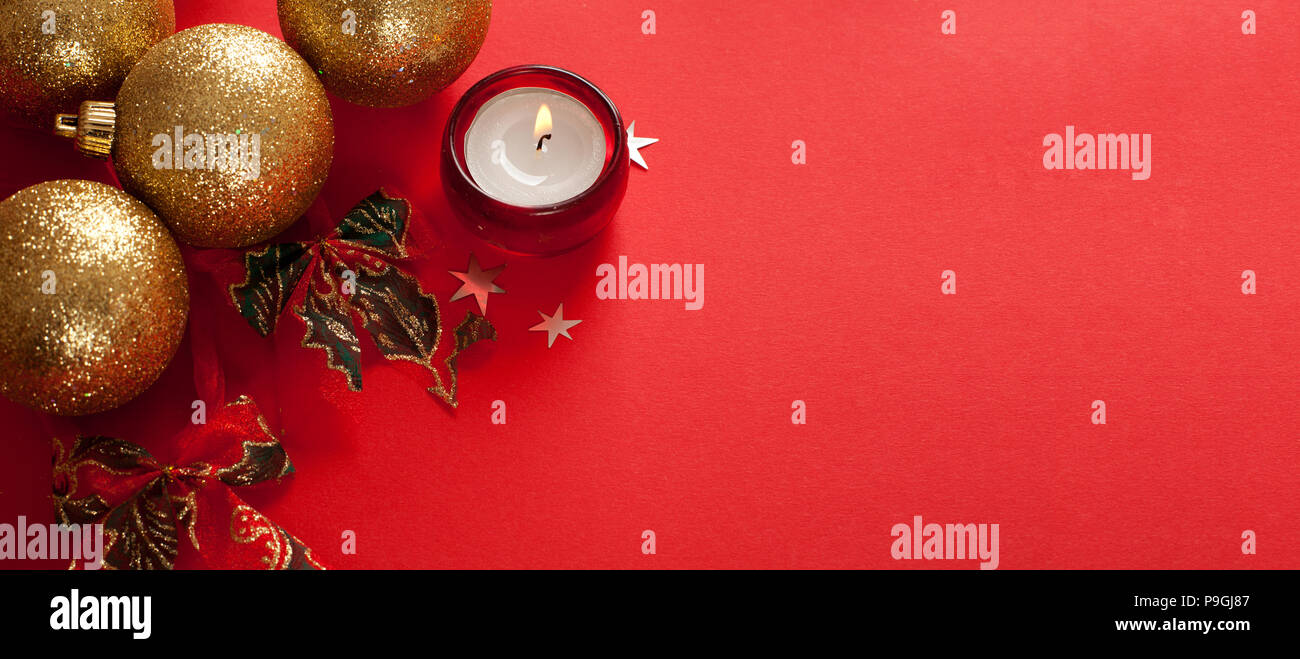 Christmas decorations on red background with copy space for text Stock ...