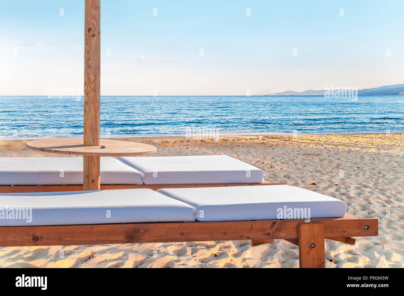 Two empty sun bed at big sandy beautiful beach for relaxation Stock ...