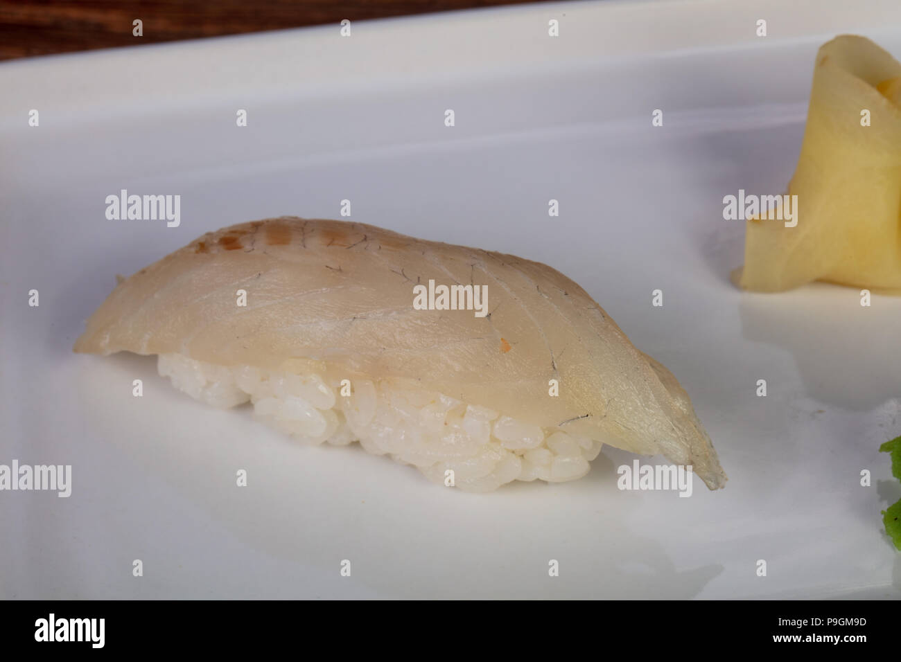 Cold Sushi with raw dorada Stock Photo - Alamy