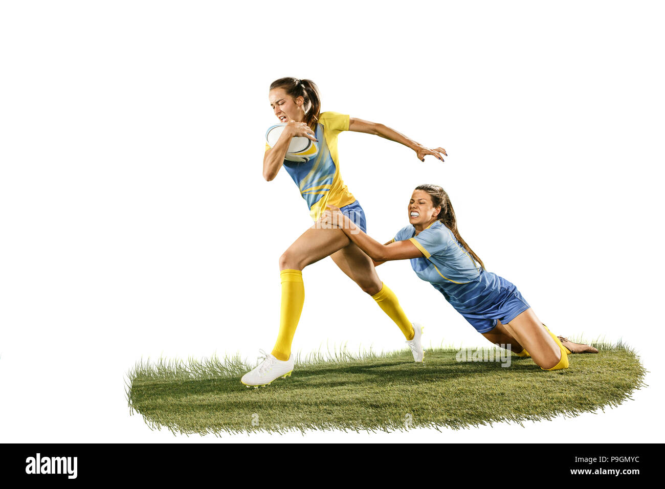 The young female rugby players isolated on white backround Stock Photo ...