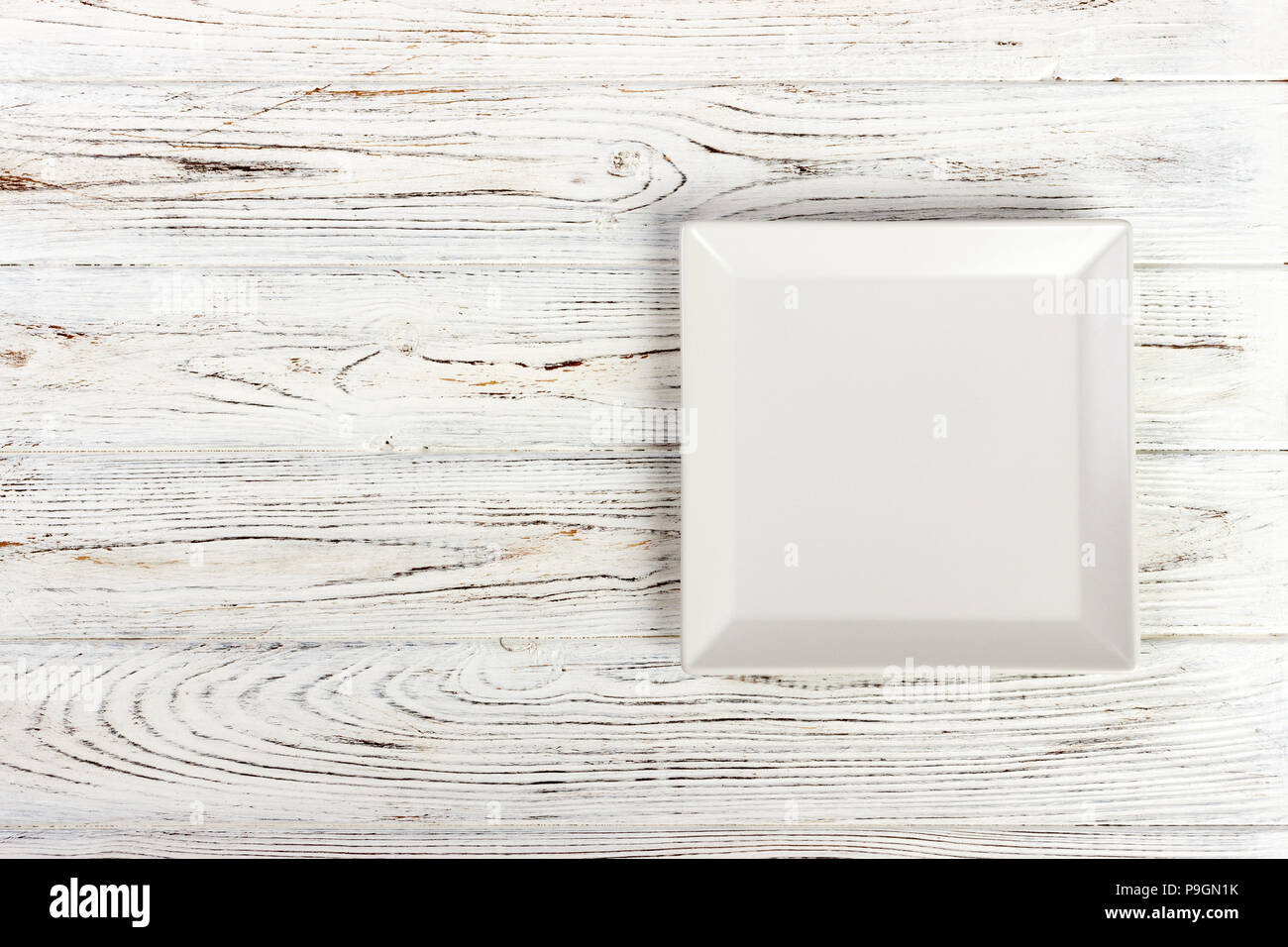 Top view empty plate on rustic wooden table with copy space Stock Photo ...