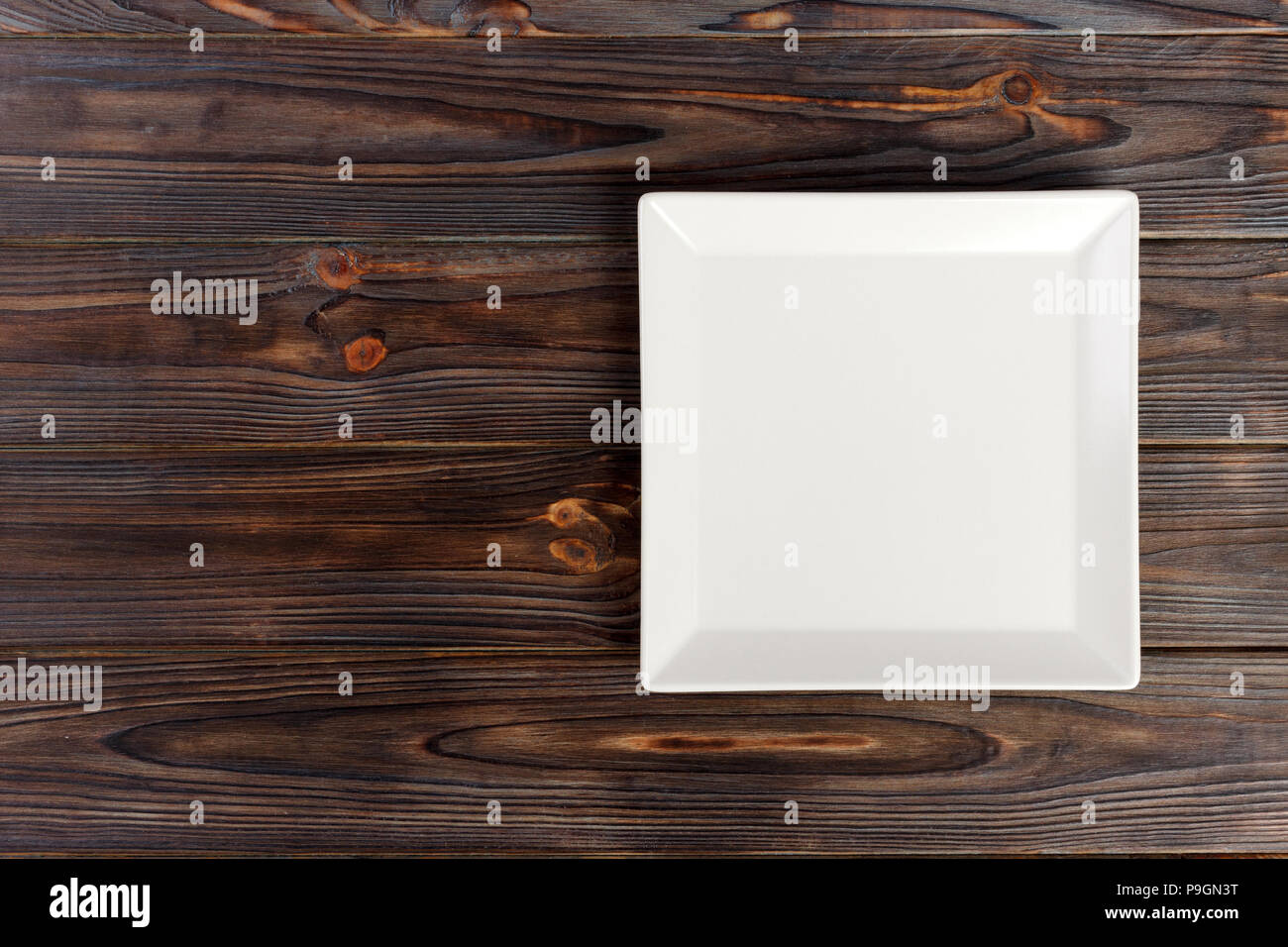Top view empty plate on rustic wooden table with copy space Stock Photo ...