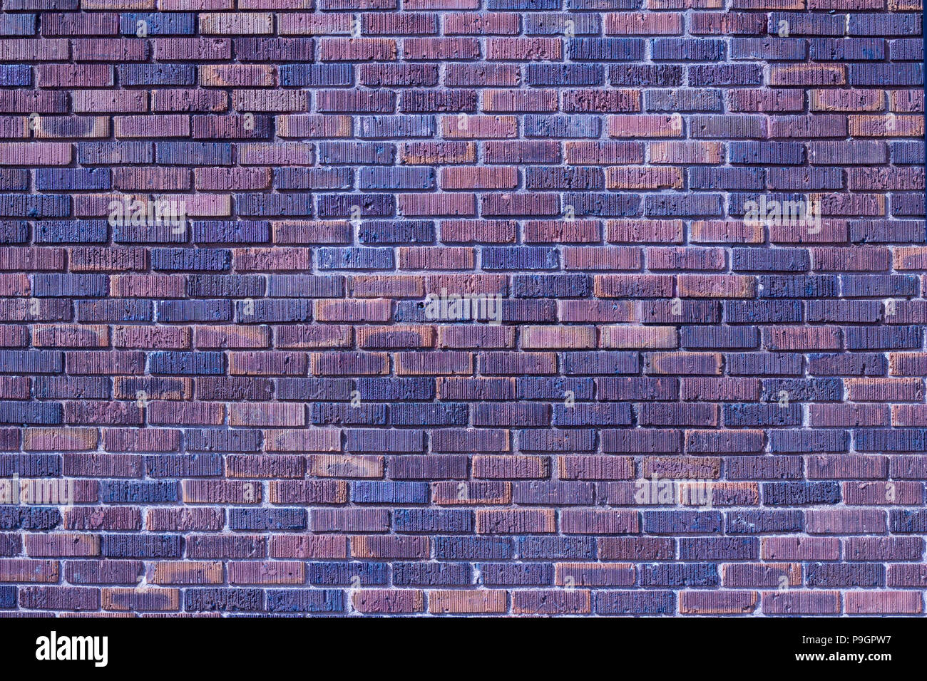 Smokey Blue and Purple Textured Brick Wall Background Stock Photo - Alamy