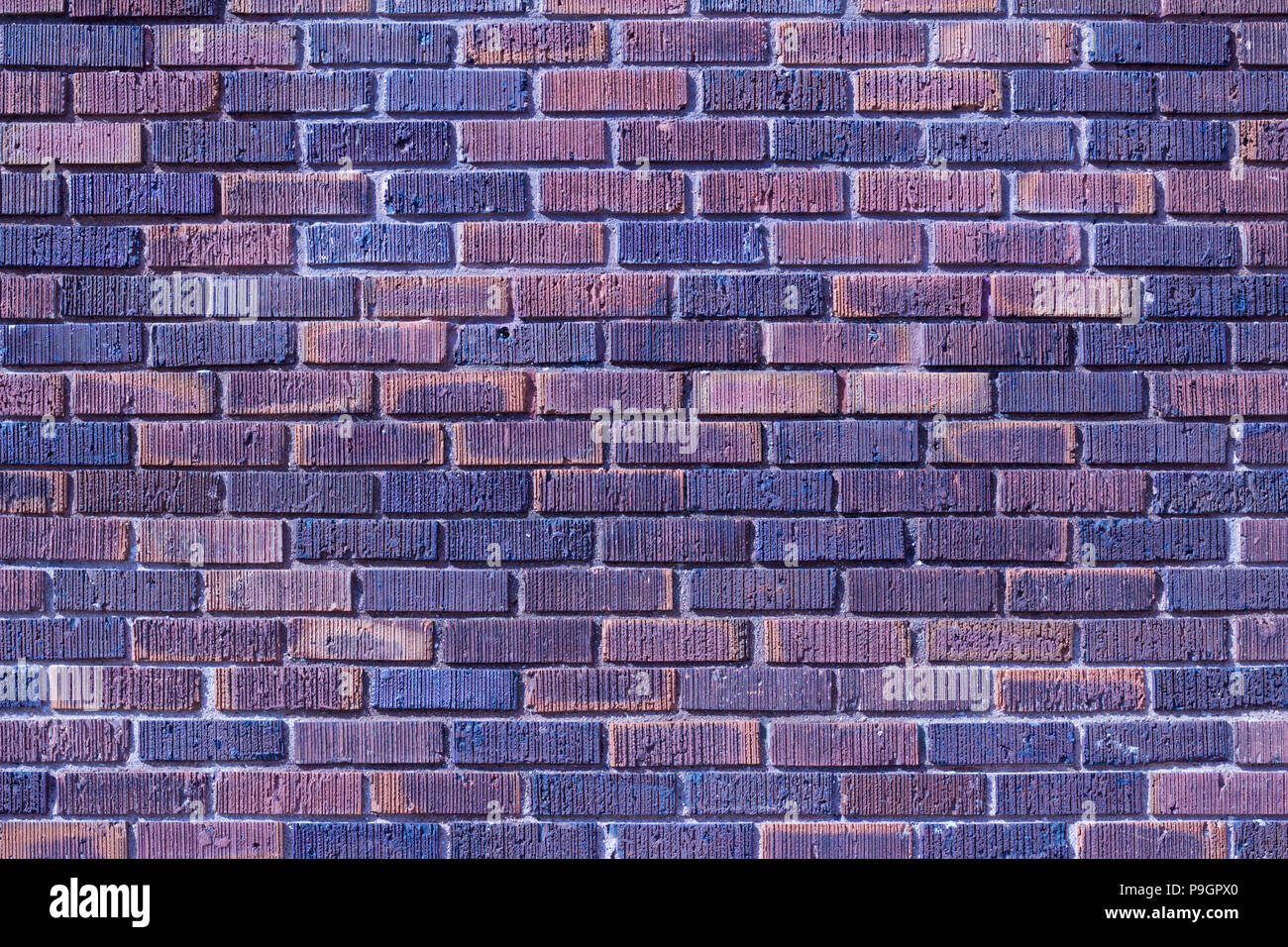 Smokey Blue and Purple Textured Brick Wall Background Stock Photo - Alamy