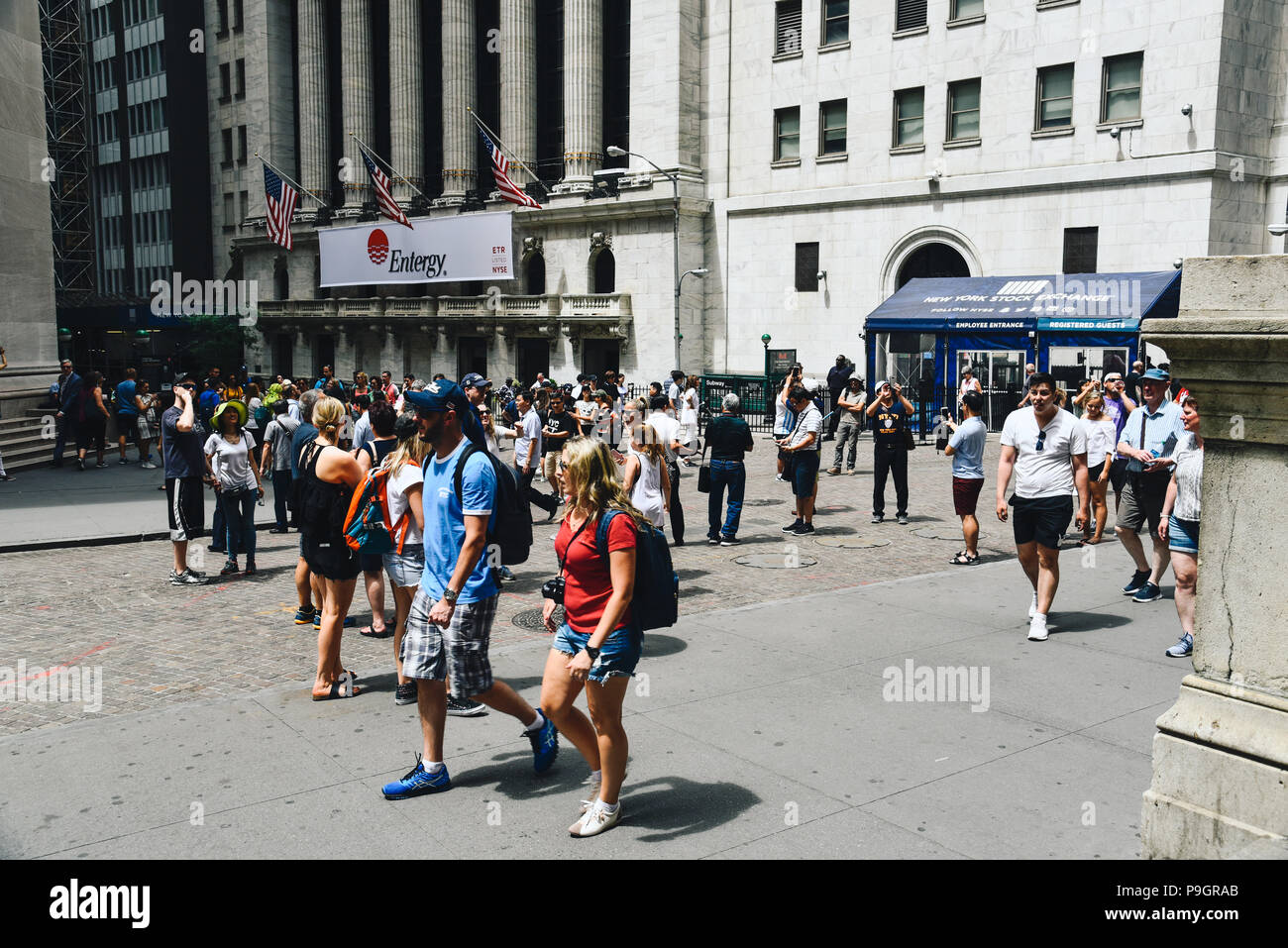 New York City, USA - June 20, 2018: A crowd of people in Wall Street in ...