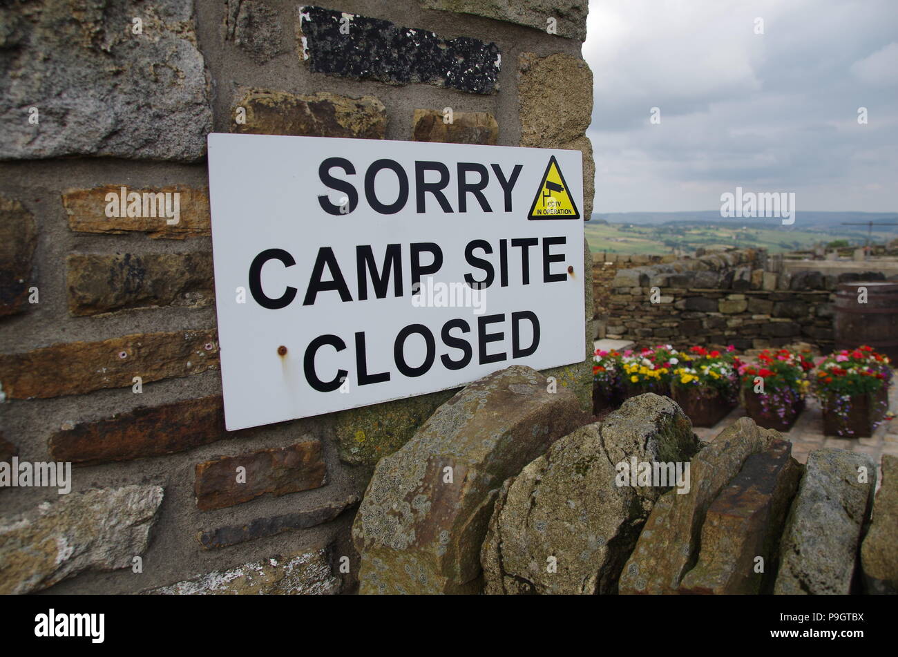 Sorry campsite closed. sign on the wall of a house. John o' groats ...