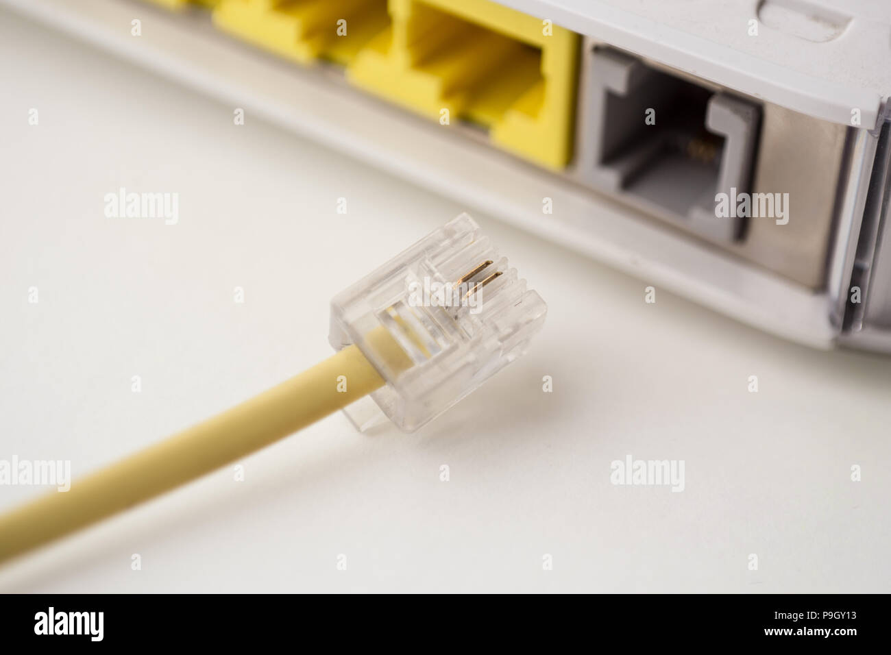 Cable for plugging in internet connection on router Stock Photo - Alamy