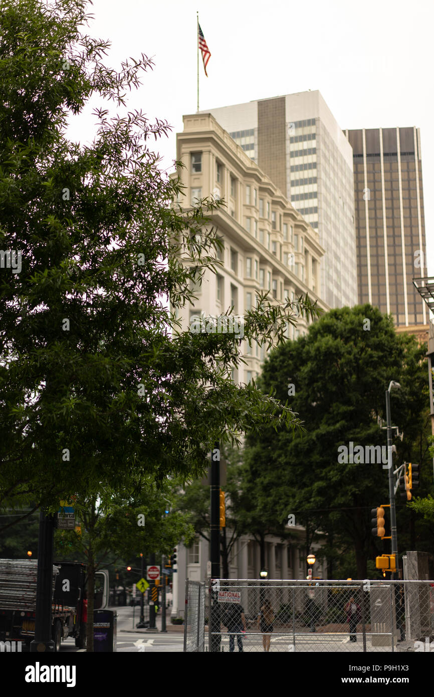 Building sits behind trees in Downtown Atlanta Stock Photo - Alamy