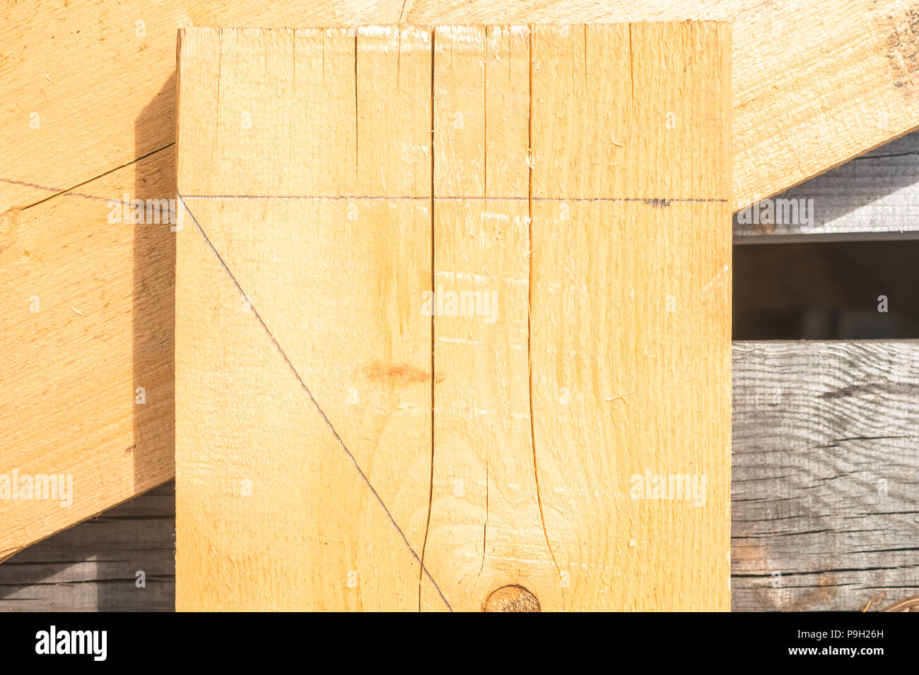 two boards lie with lines of marking for construction Stock Photo - Alamy