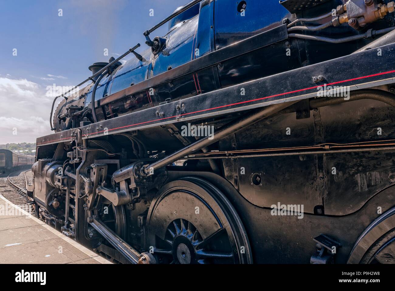 An old steam locomotive of the North Yorkshire Moors Railway stands in ...