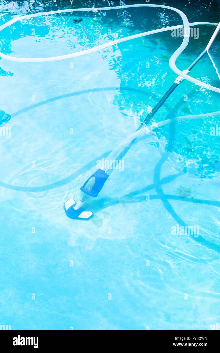 Pool vacuuming hi-res stock photography and images - Alamy