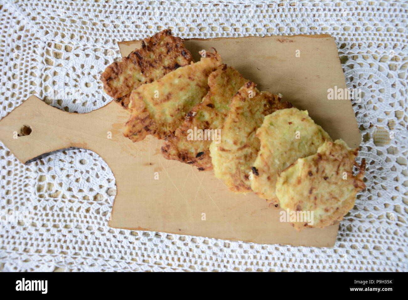 cooked cutlets from courgettes in the home kitchen Stock Photo - Alamy
