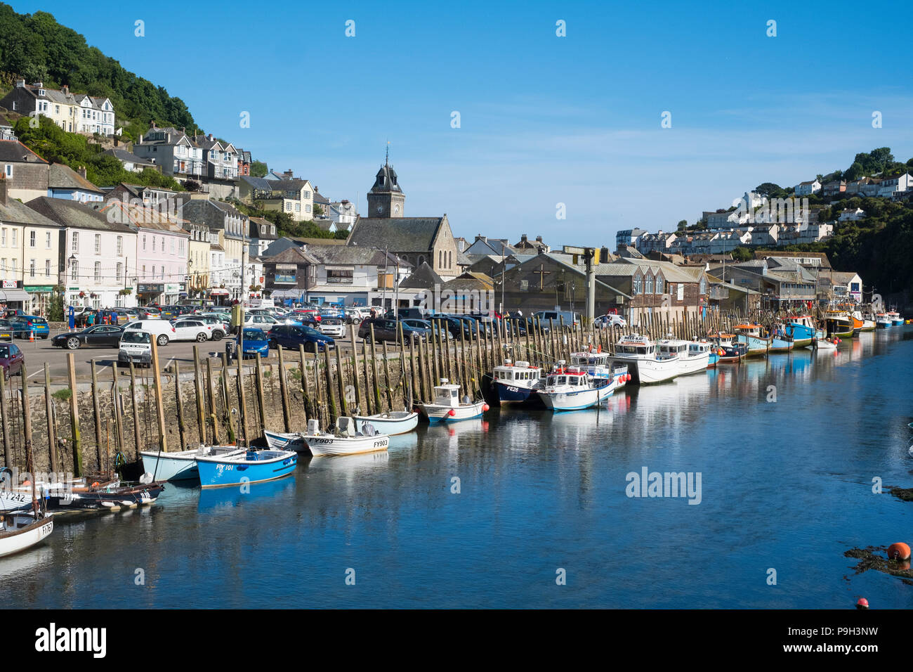 Boats moored in the harbour at the fishing port of Looe, Cornwall ...