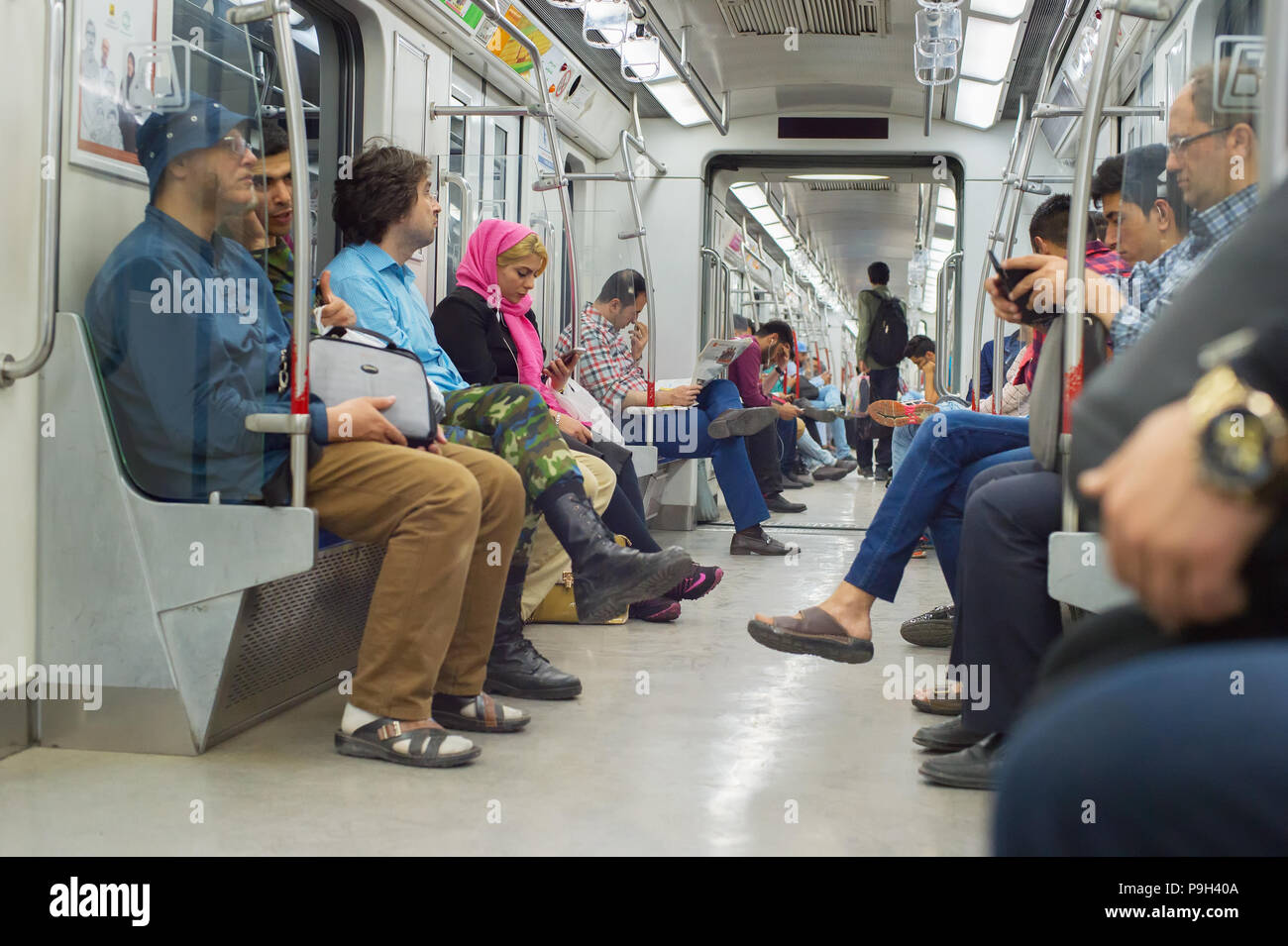 TEHRAN, IRAN - MAY 22, 2017: People at metro train in Tehran. The metro ...