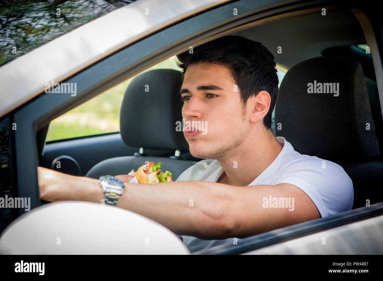 Eating at the car wheel hi-res stock photography and images - Alamy