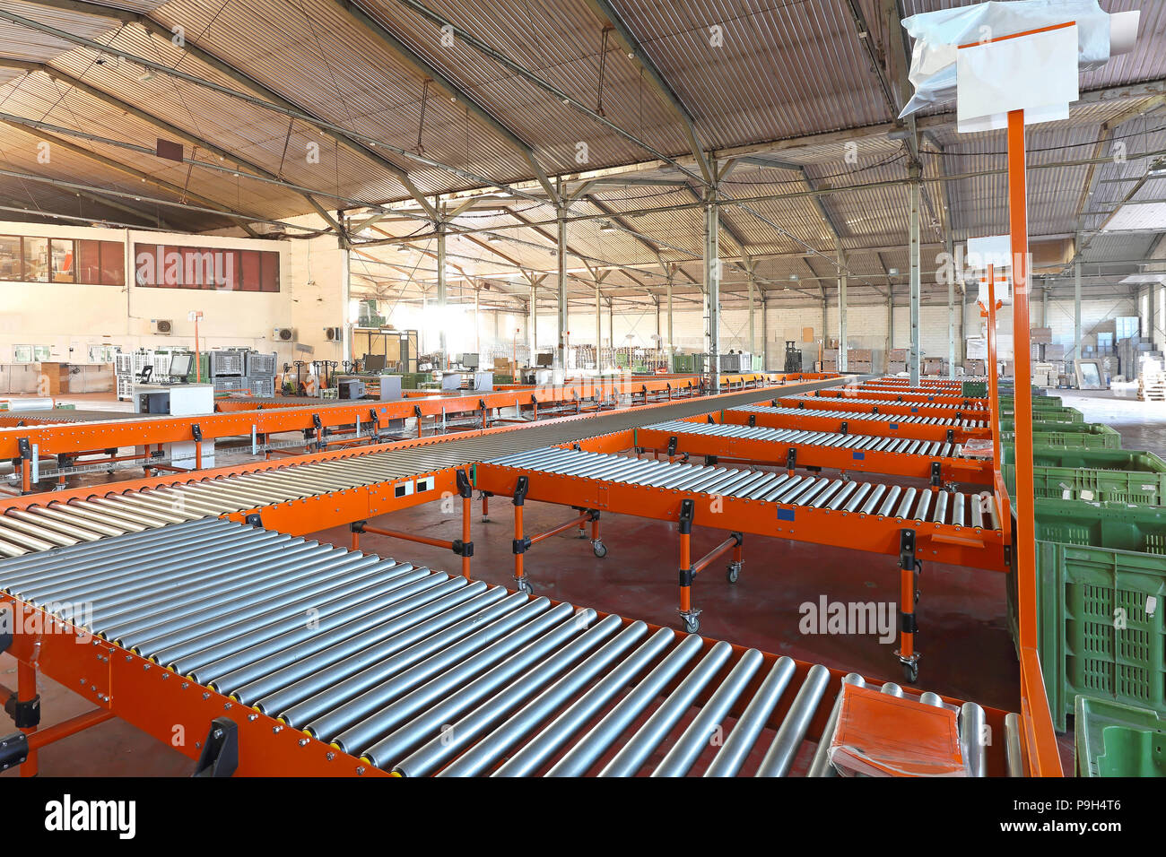 Conveyer belt system in sorting warehouse Stock Photo - Alamy