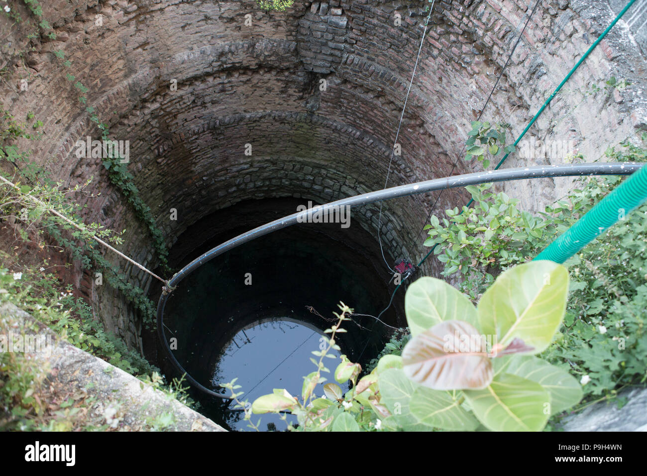 A view down a water well on a farm in India Stock Photo - Alamy