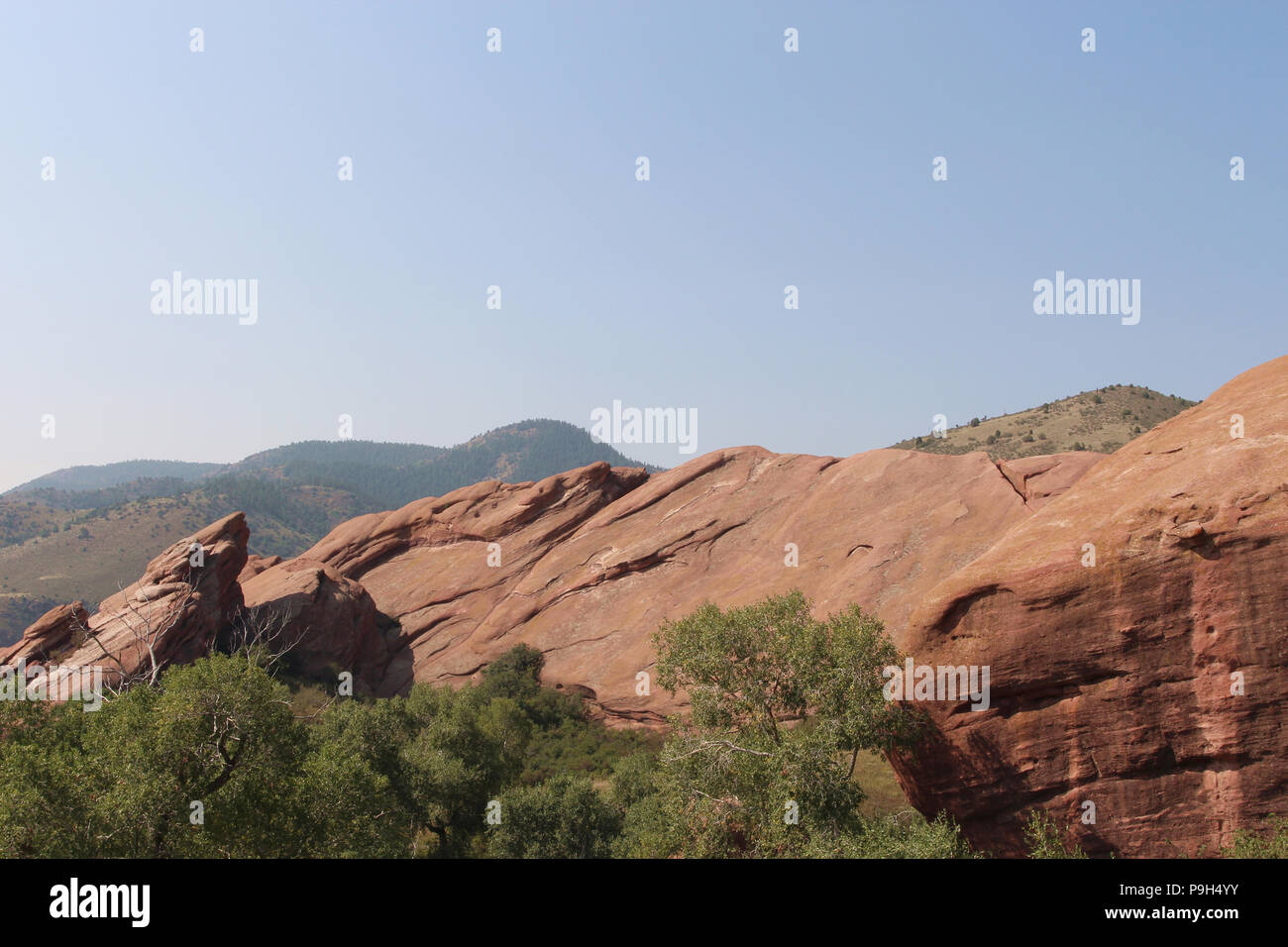 Close up of large red rock formations, jutting out of the ground ...