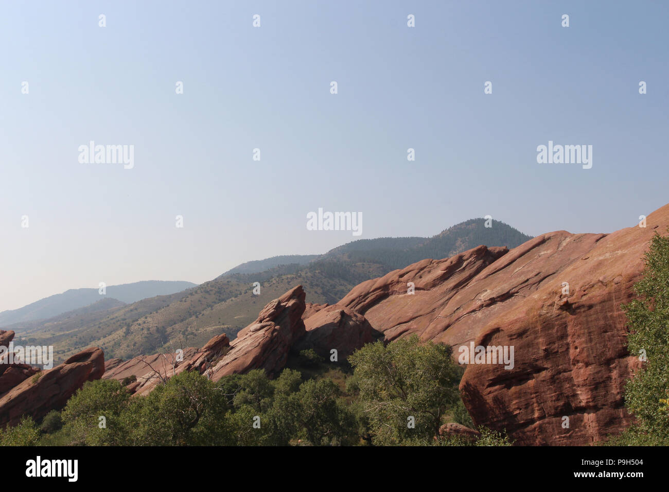 Close up of large red rock formations, jutting out of the ground ...