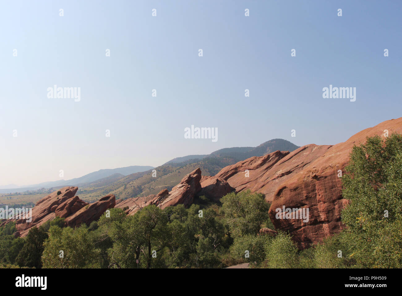 Close up of large red rock formations, jutting out of the ground ...