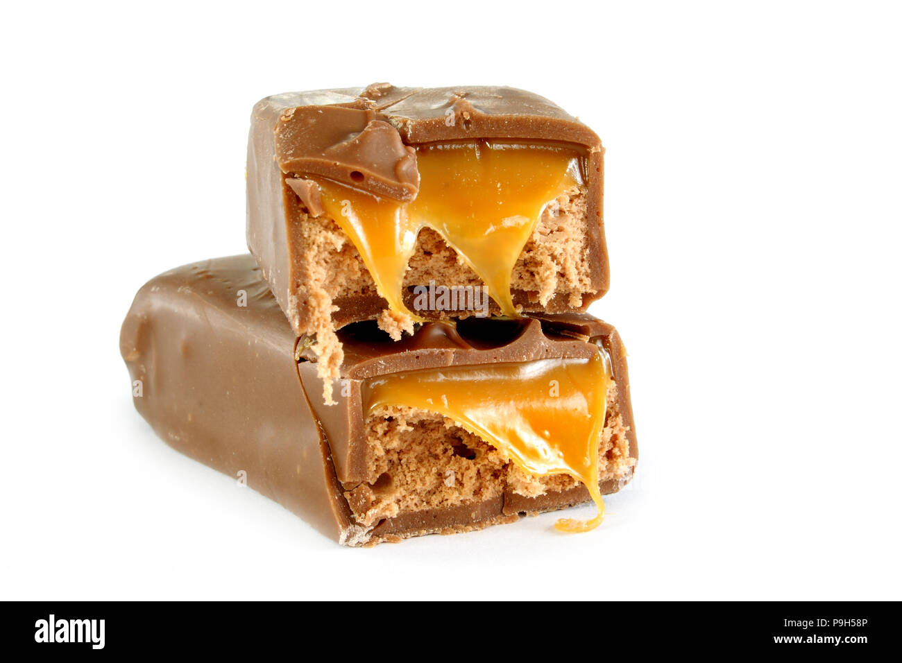 Chocolate bar with caramel isolated on white background Stock Photo - Alamy