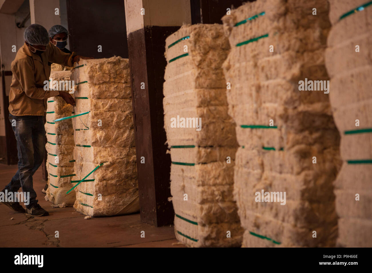 Bio Cotton being stored in a warehouse at a garment factory, where ...