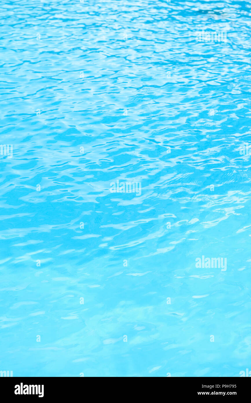 Blue water in swimming pool for background Stock Photo - Alamy