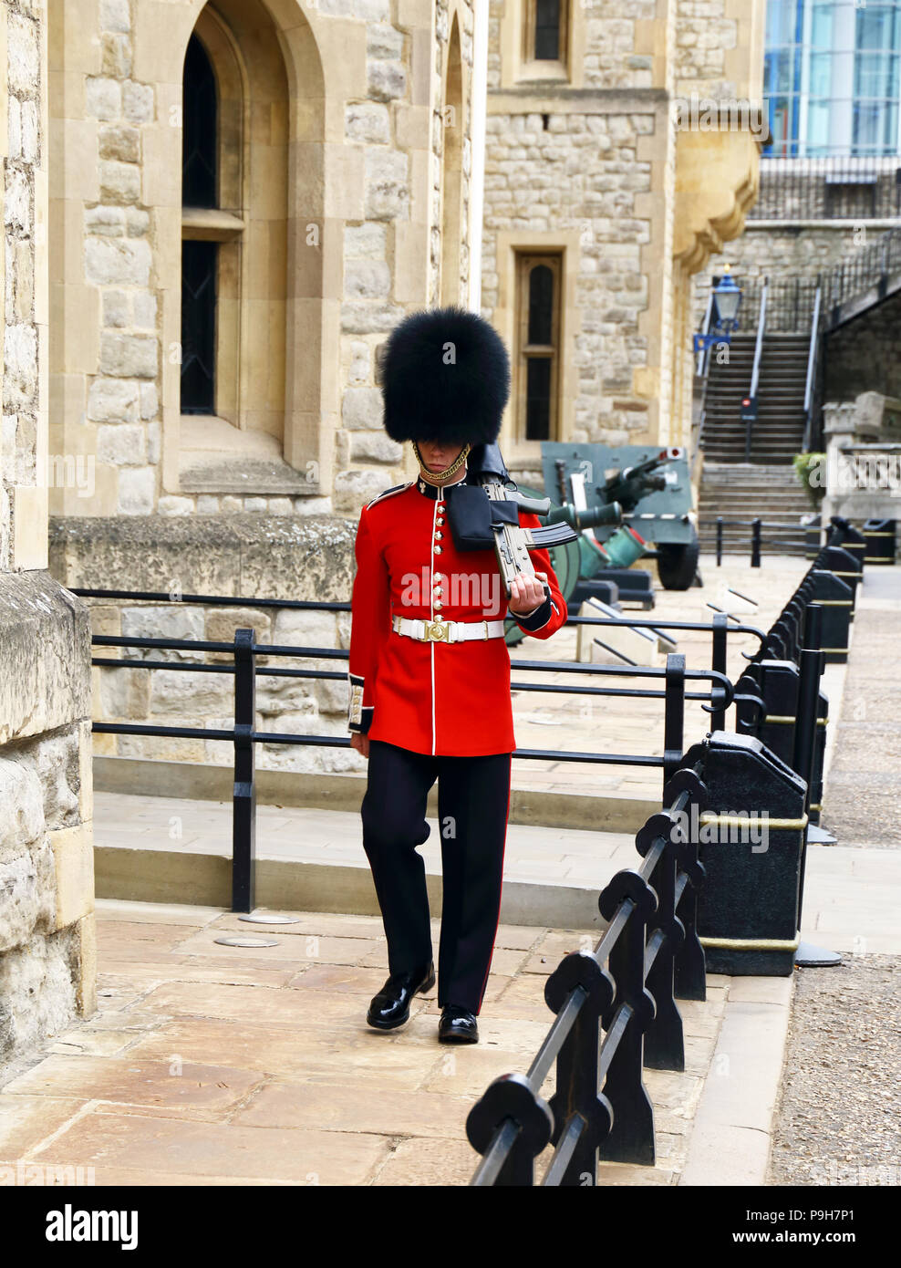 A member of the Queen's Guard marches and stands sentinal at the Tower ...