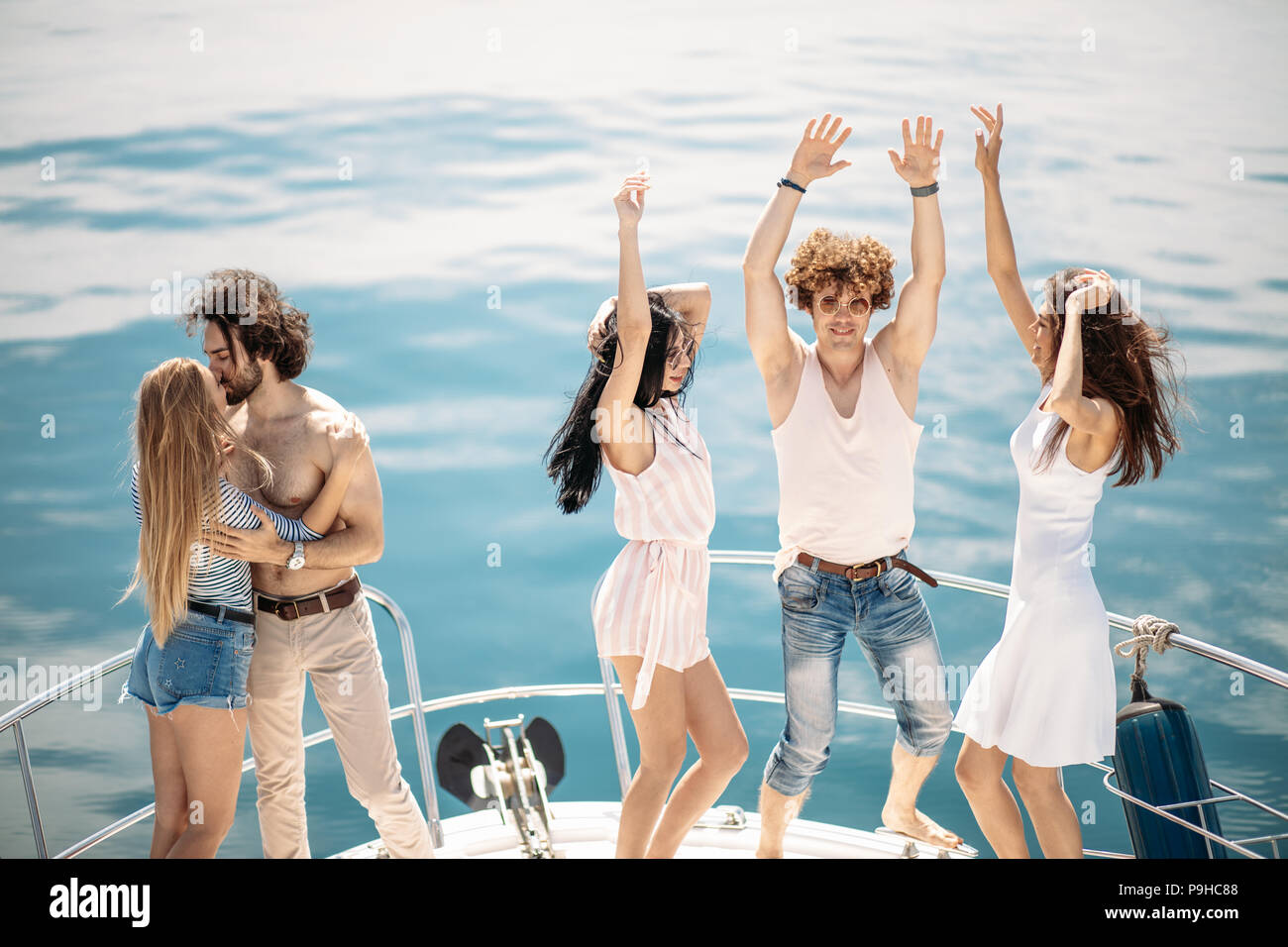 Young yoyful people having fun in boat party - Happy friends enjoying ...
