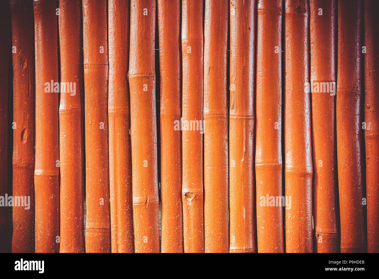 Vintage orange wooden bamboo wall background Stock Photo - Alamy