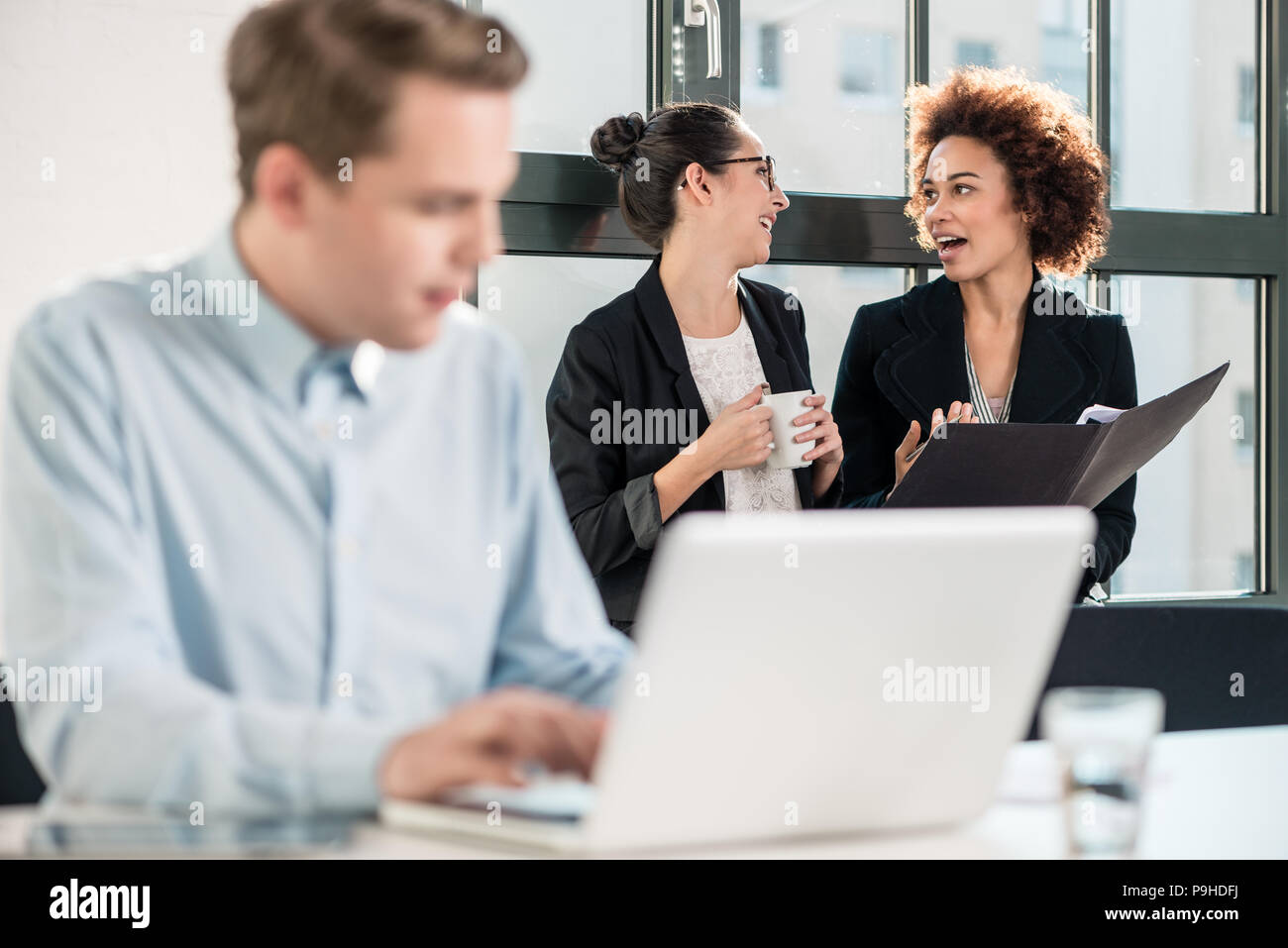 Cheerful young african talking hi-res stock photography and images - Alamy