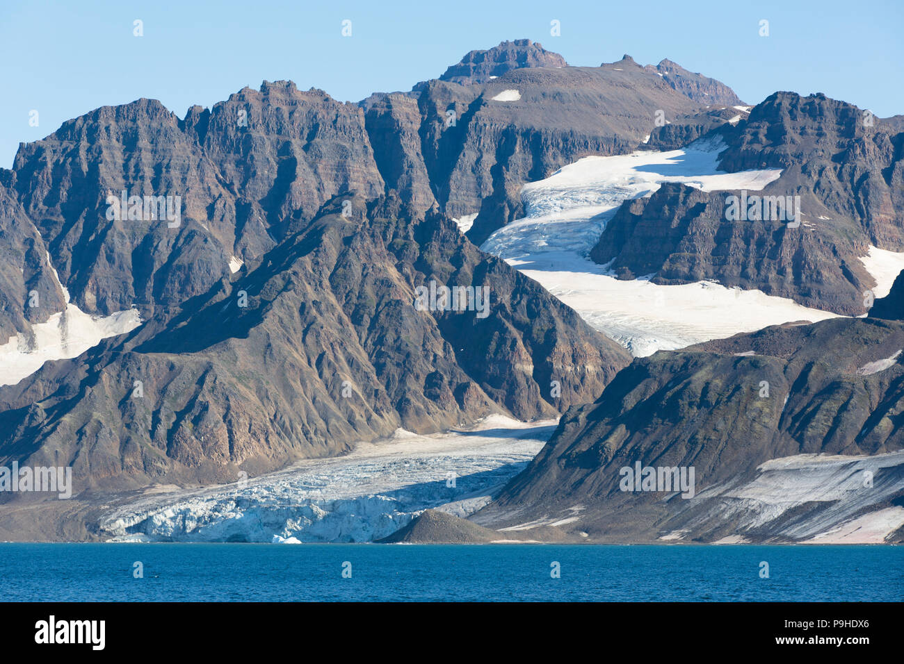 Coastline of Eastern Greenland, with glaciers and icebergs Stock Photo ...