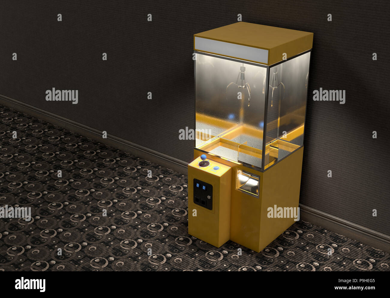 A yellow empty arcade type claw grabber game in a dimly lit vintage ...