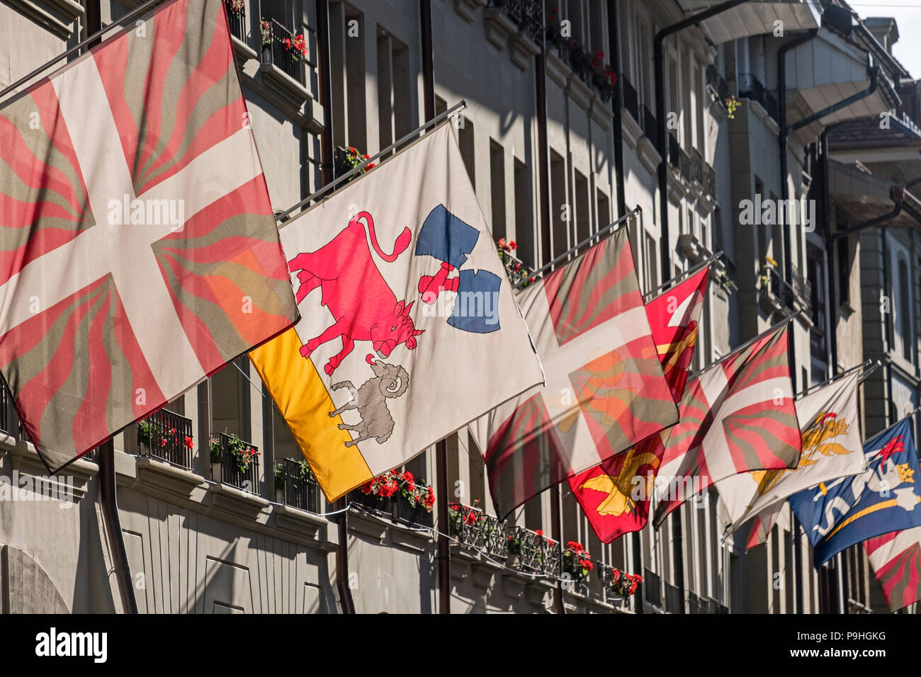 Colourful flags Old Town Bern Switzerland Stock Photo - Alamy