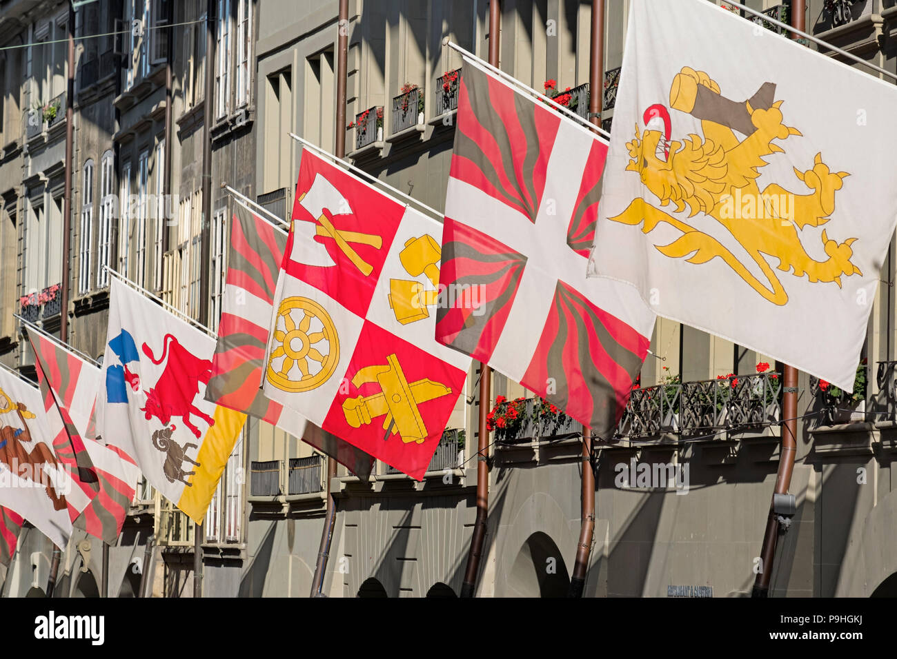 Colourful flags Old Town Bern Switzerland Stock Photo - Alamy