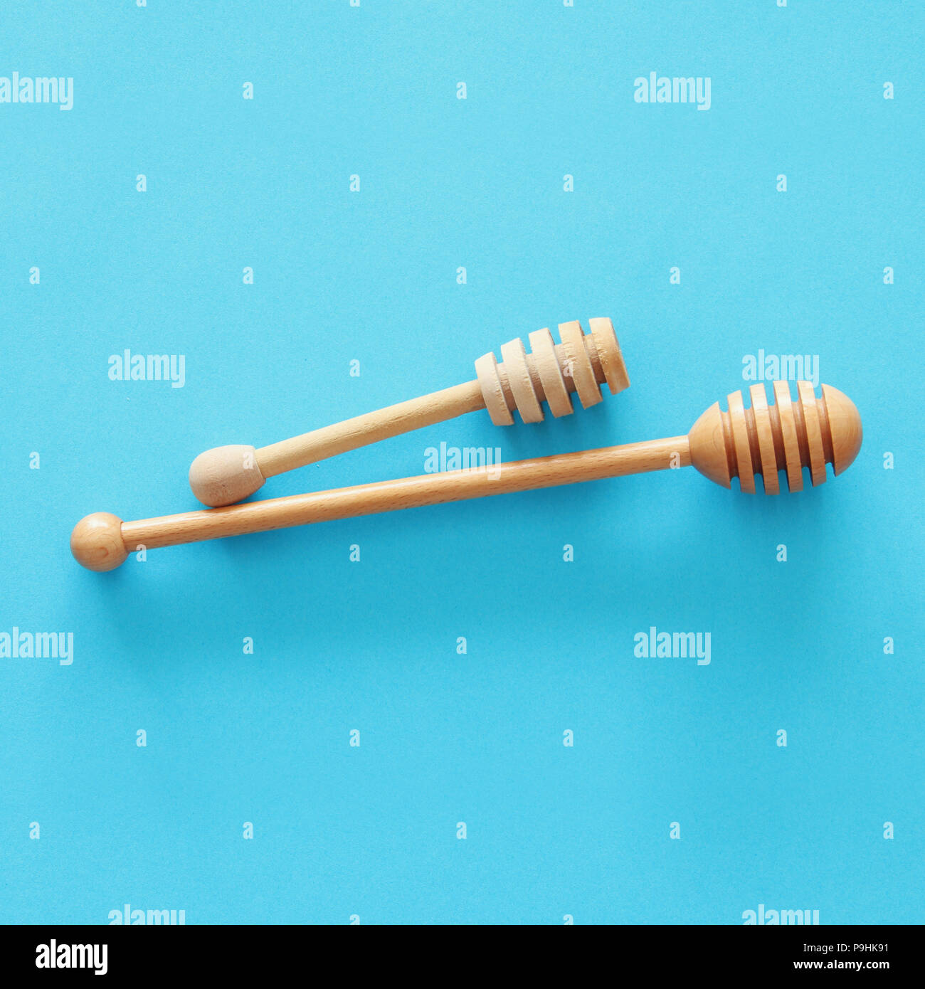 Rosh hashanah (jewish New Year holiday) concept. HONEY WOODEN STICK ...