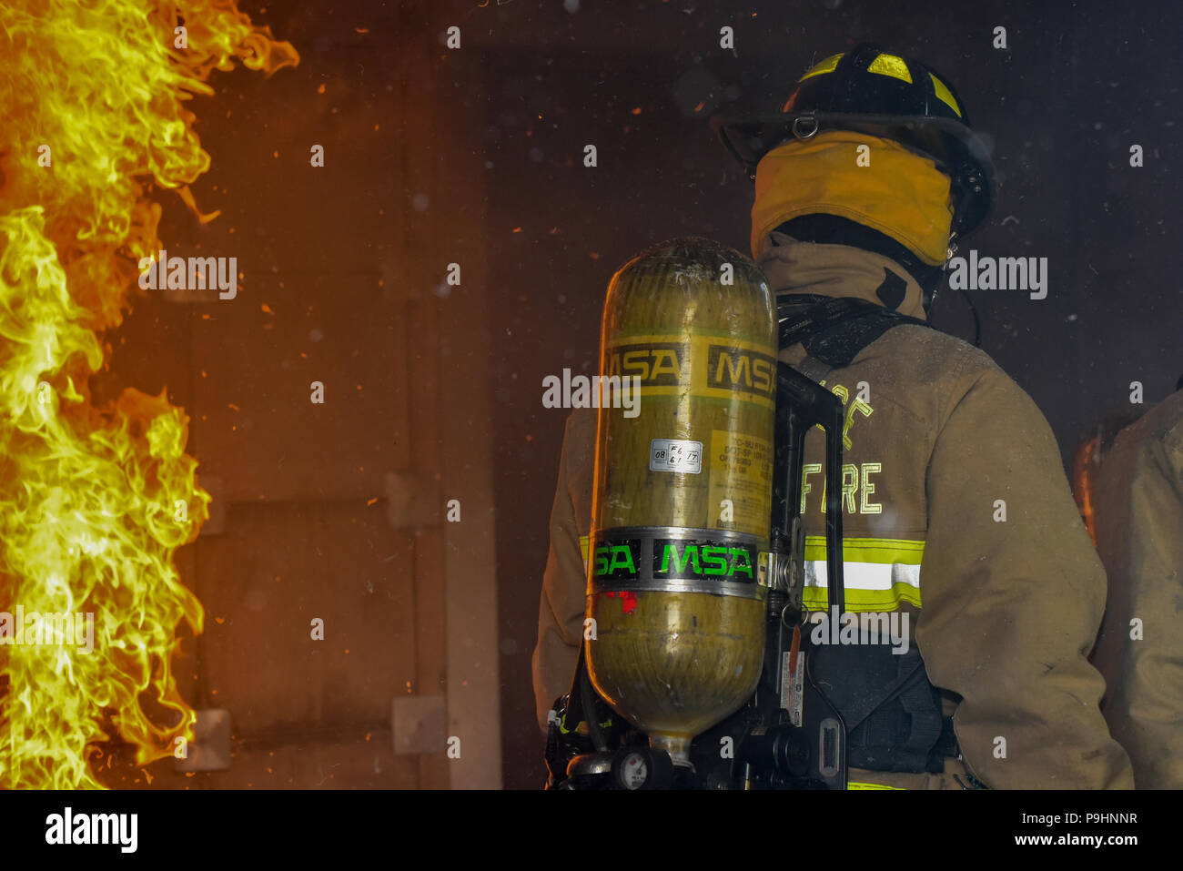 A firefighter with with 11th Civil Engineering Squadron Fire Emergency ...