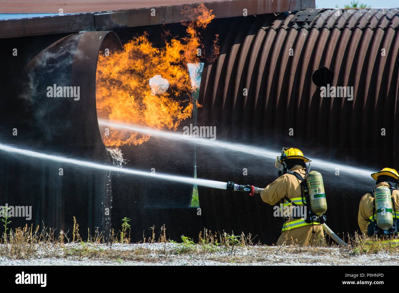 Firefighters assigned to the 139th Fire Emergency Services, Missouri ...