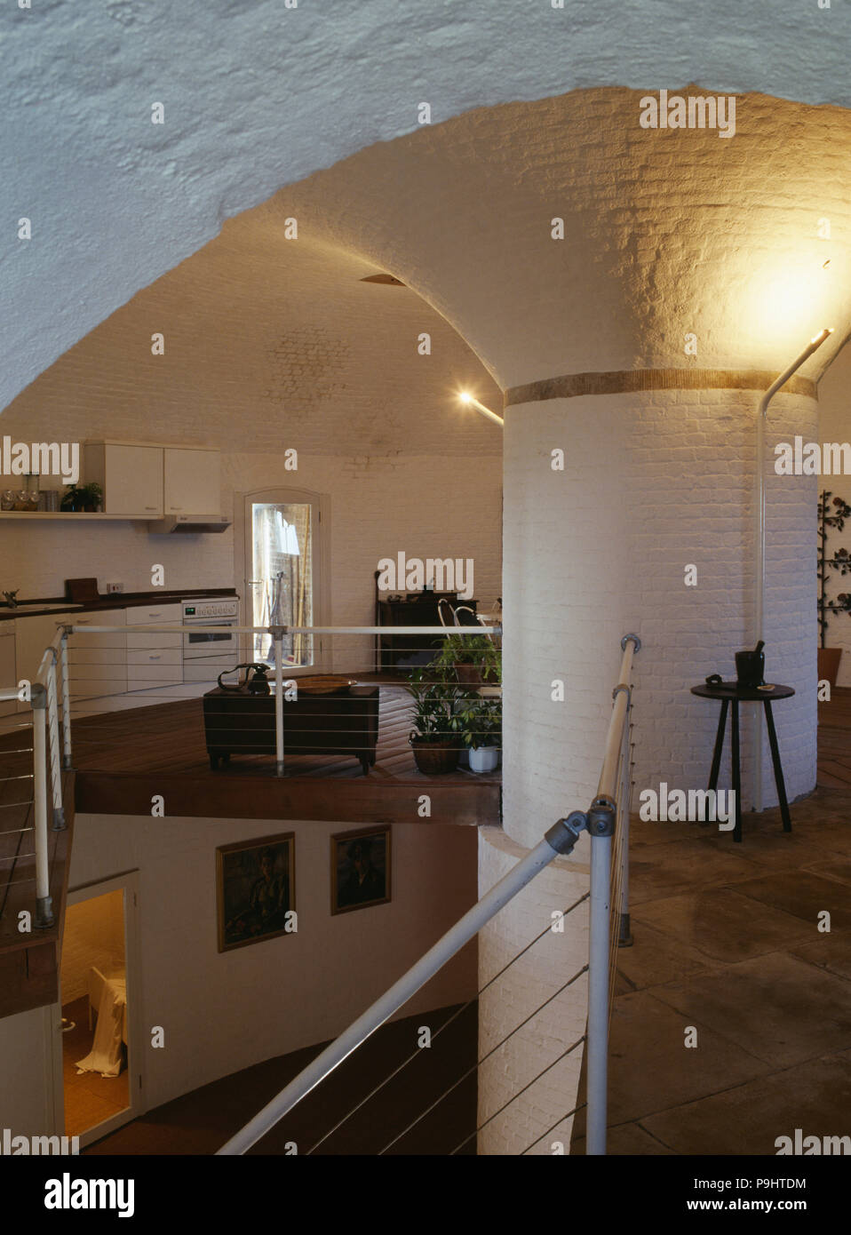 Modern kitchen on mezzanine floor in converted Martello Tower Stock ...
