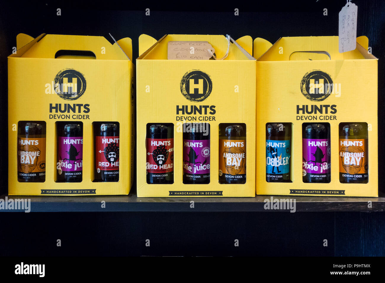 Devon craft cider Hunts in boxes on display Stock Photo - Alamy