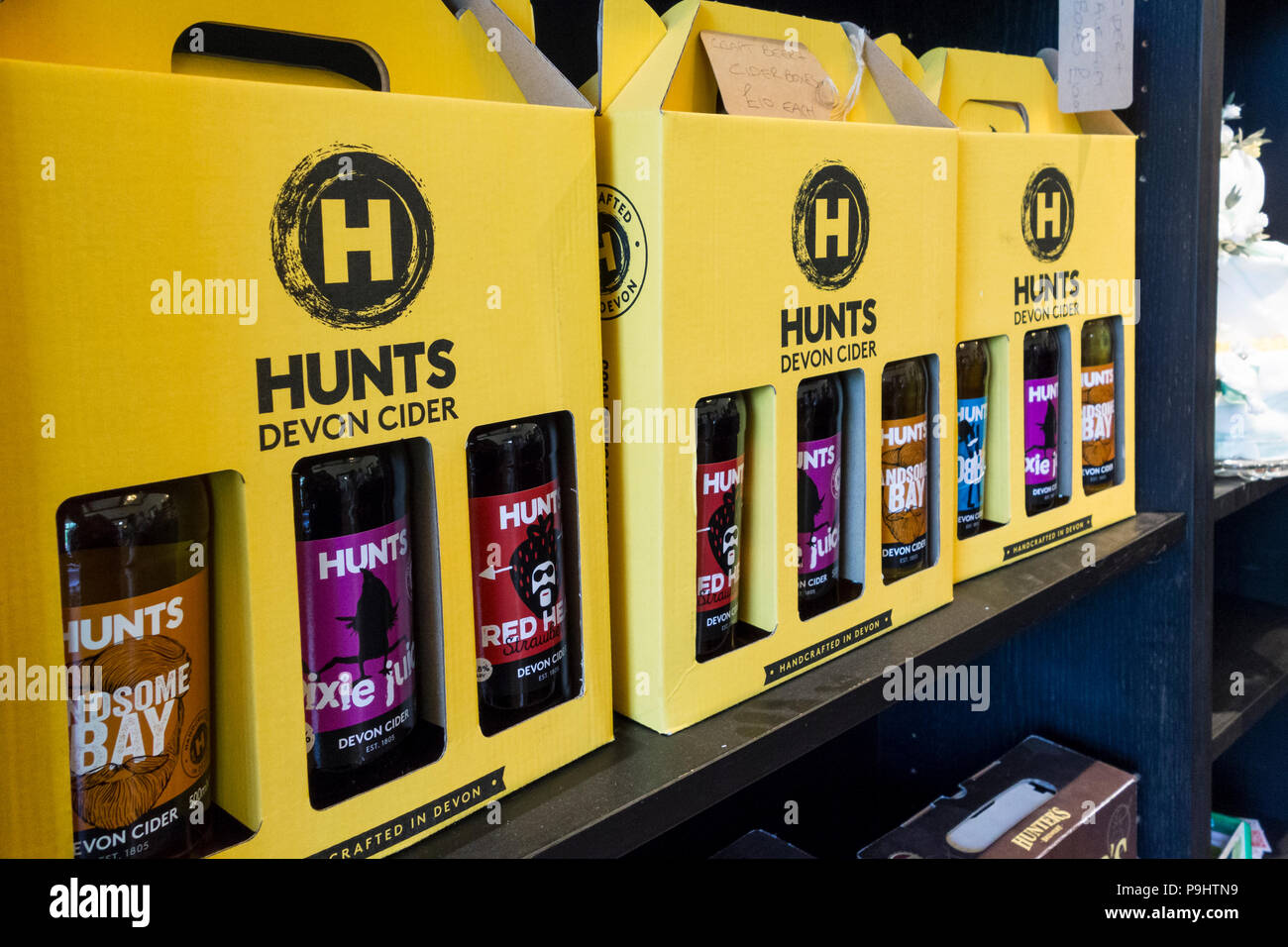 Devon craft cider Hunts in boxes on display Stock Photo - Alamy
