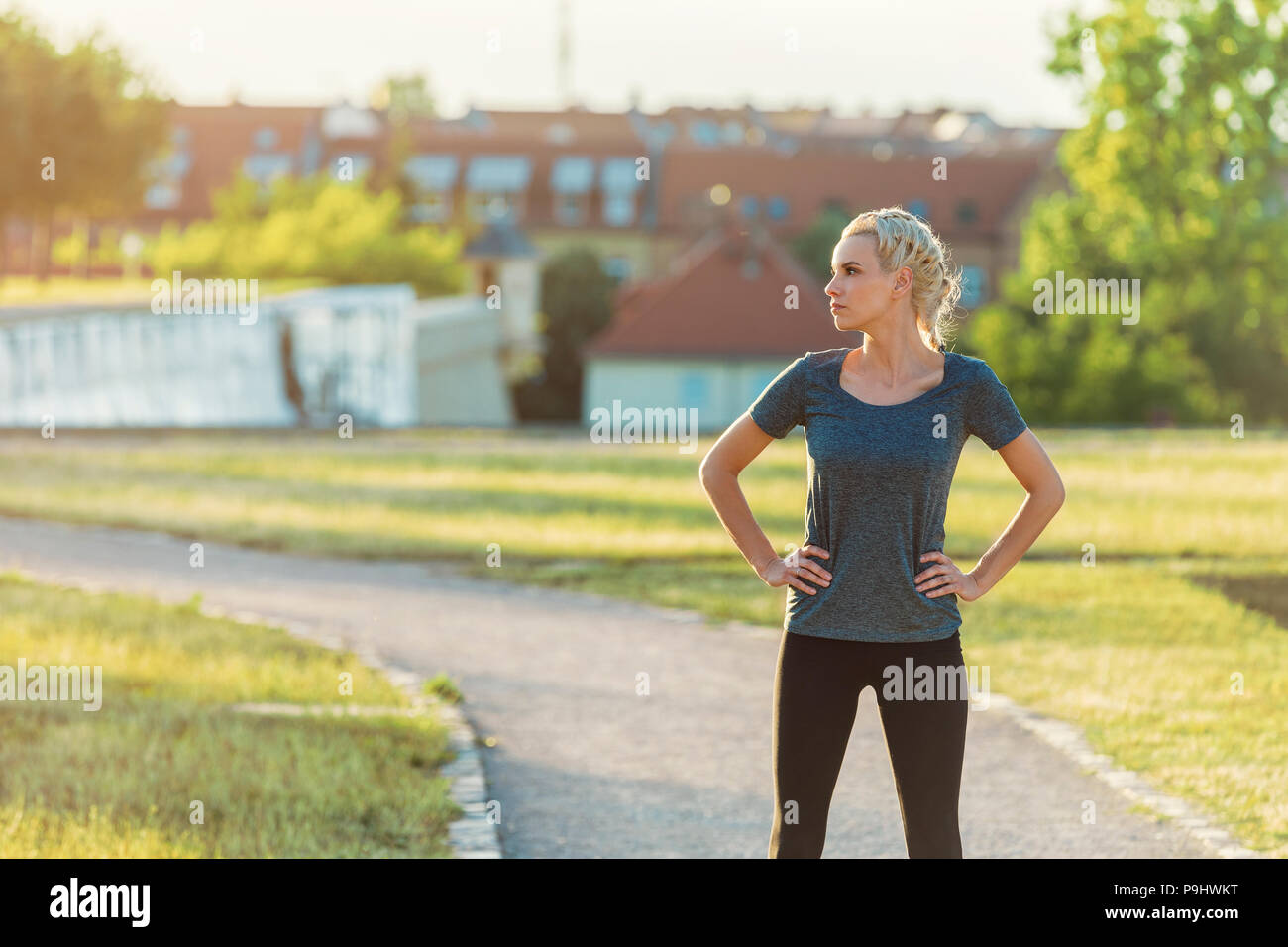 Blonde girl running park hi-res stock photography and images - Alamy