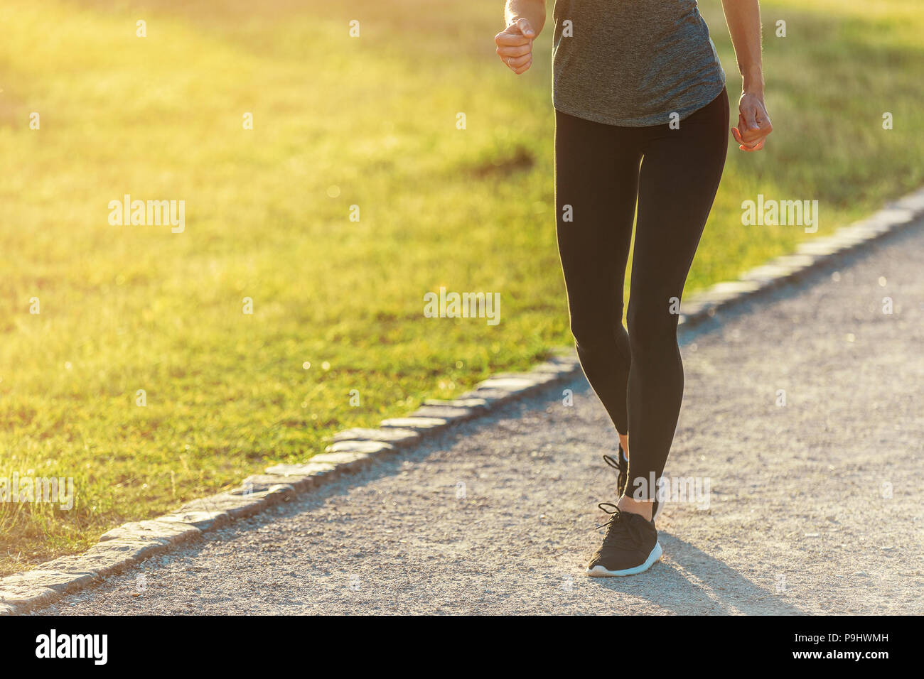 Young blonde woman jogging in hi-res stock photography and images - Alamy