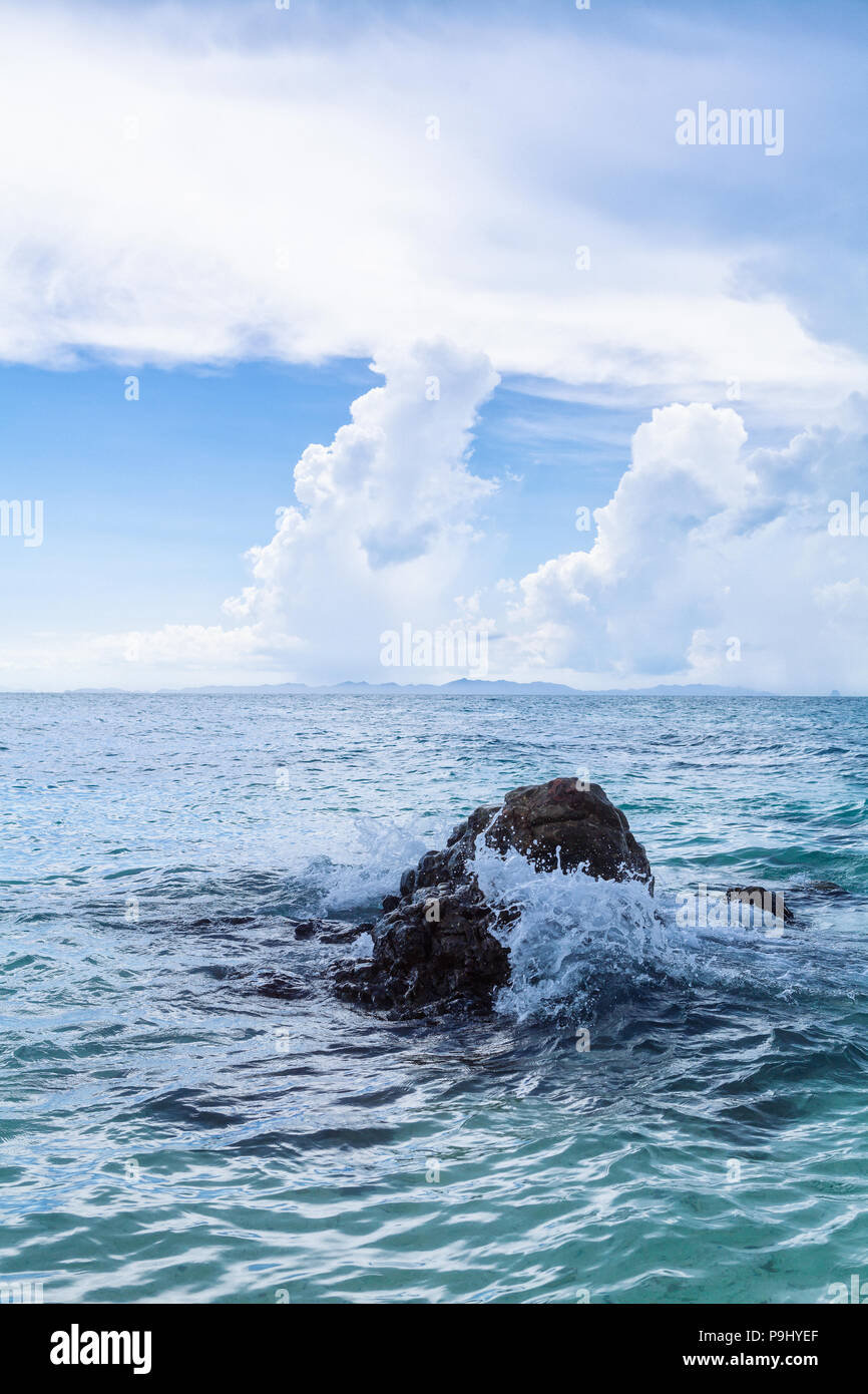 Waves crash against a rock hi-res stock photography and images - Alamy