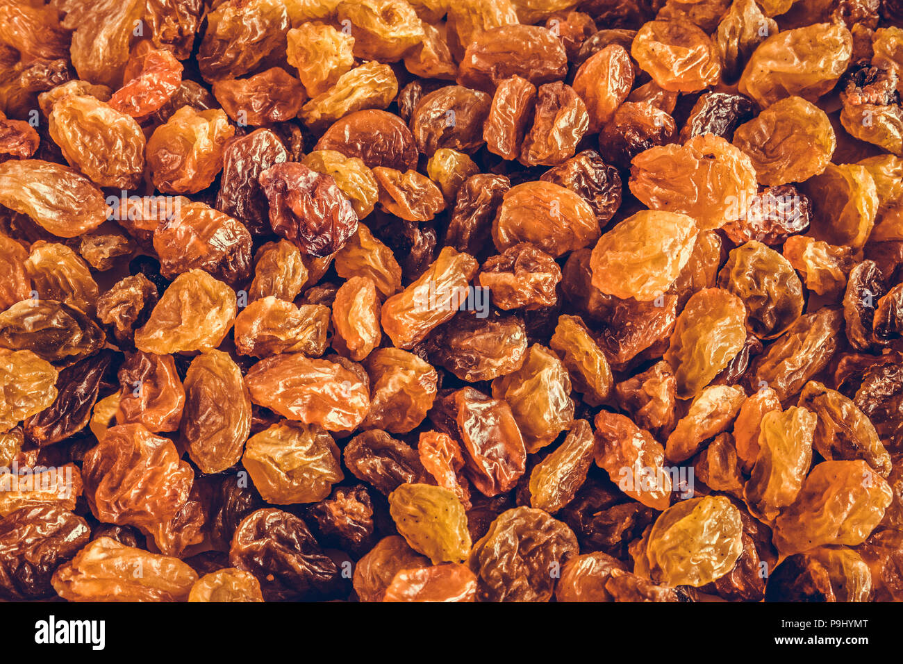 Sweet raisins, can be used as background Stock Photo - Alamy