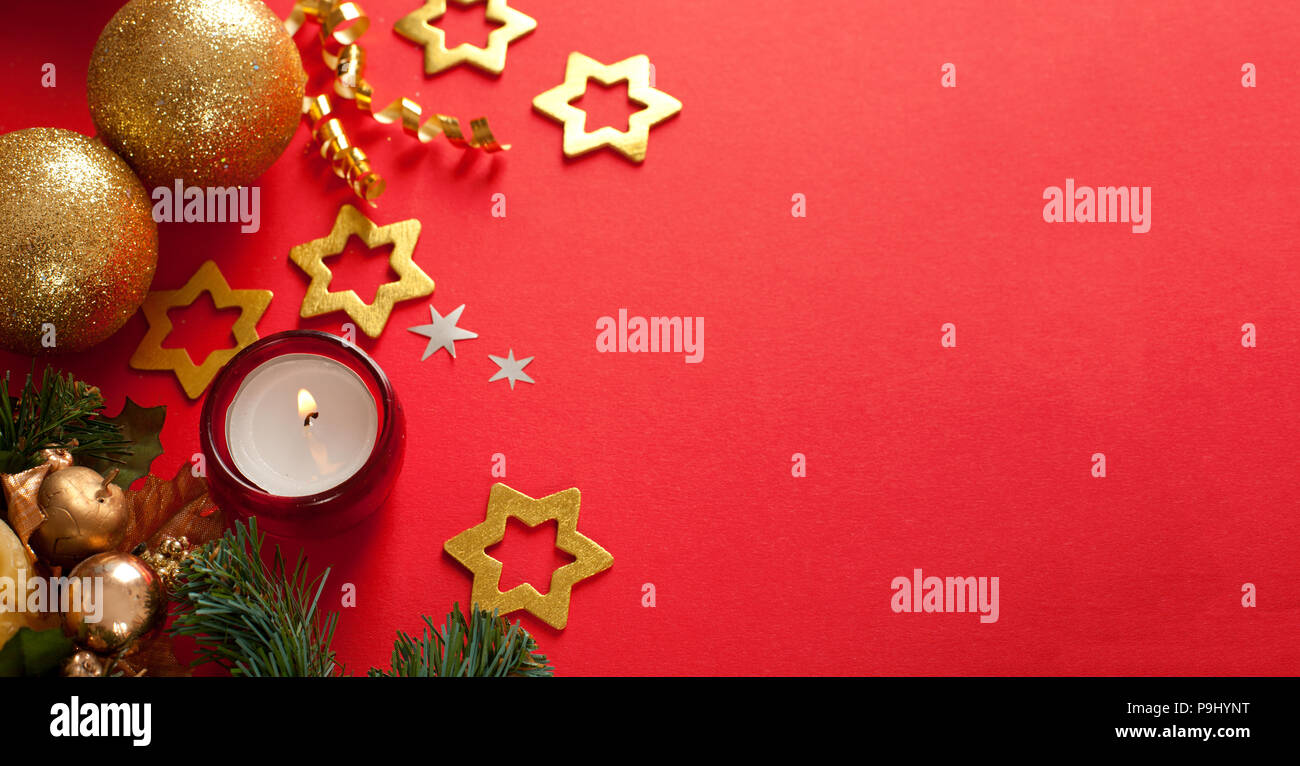 Christmas decorations on red background with copy space for text Stock ...