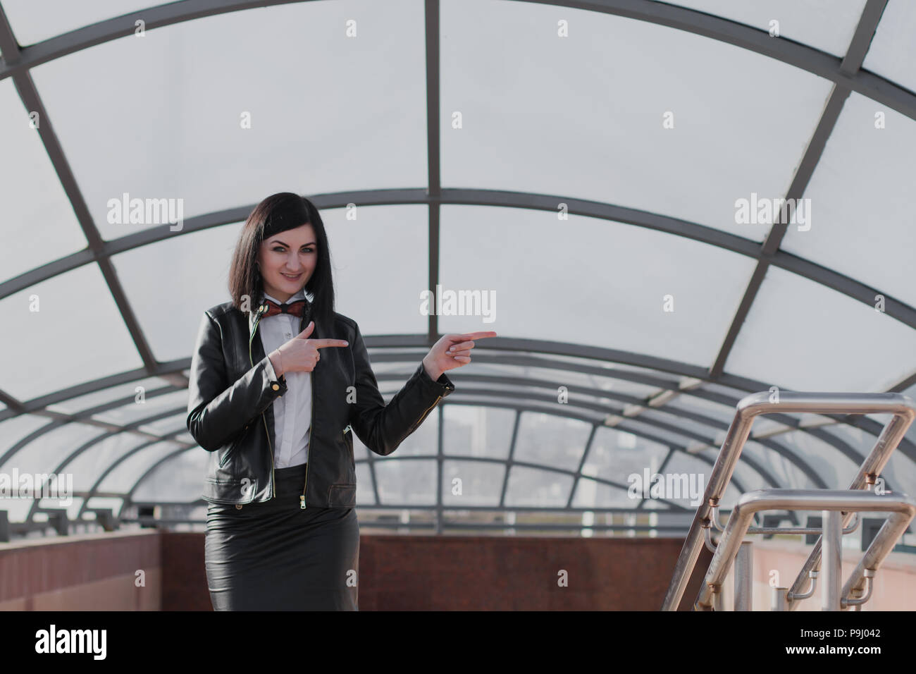 Modern business, female businesswoman working outdoors over a new idea ...