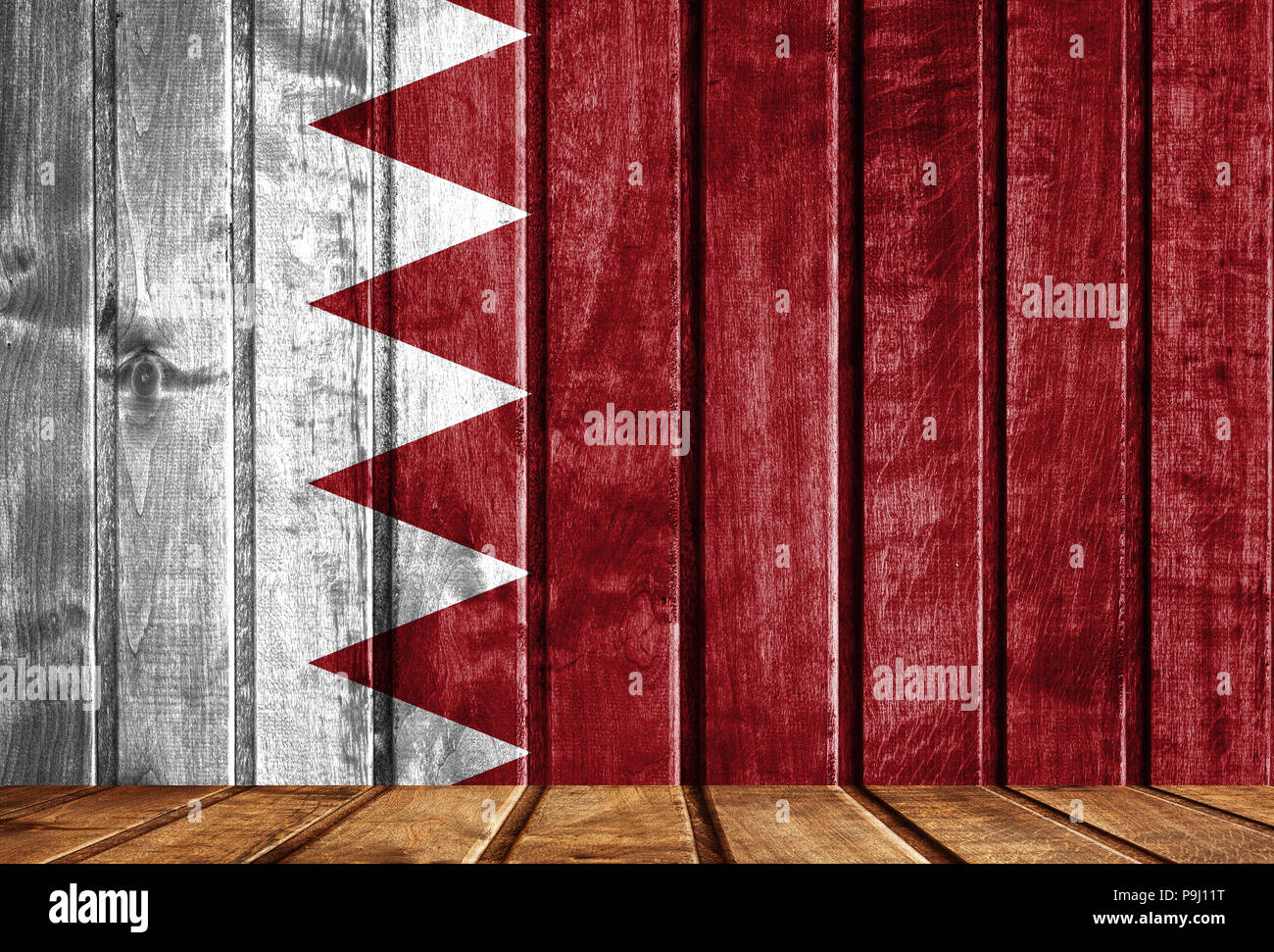 Wooden background with a flag of Bahrain. There is a place for your ...